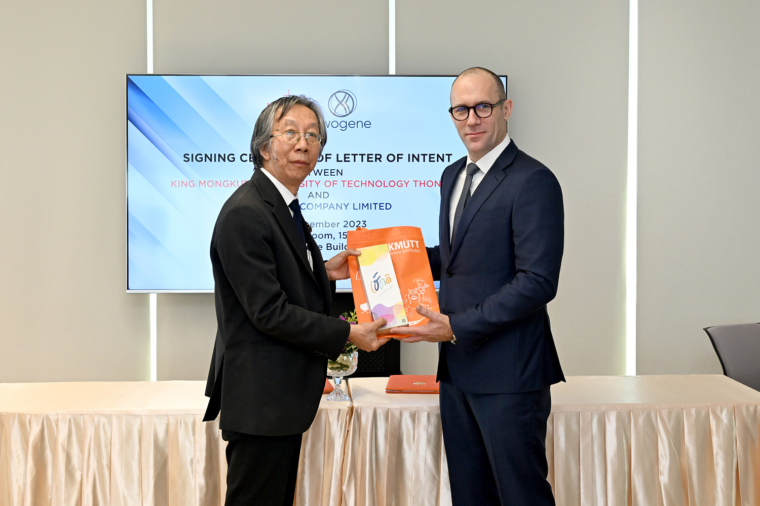 KMUTT signed a contract with Twogene Company Limited to rent a building ...